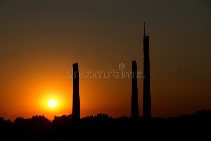 Industrial Buildings at Sunset Sky Stock Image - Image of fumes ...