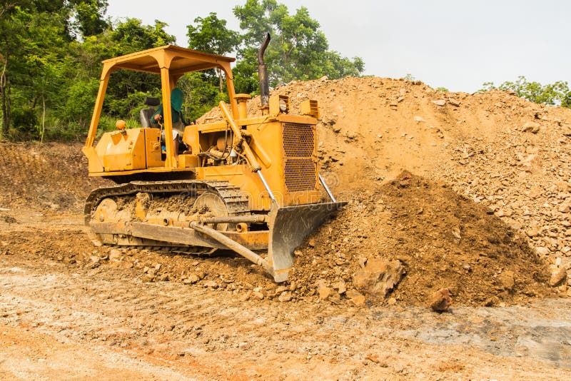 Industrial Bulldozer Moving Earth Pit or Quarry Stock Photo - Image of ...