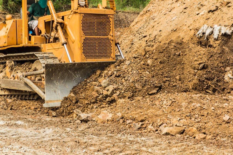 Industrial Bulldozer Moving Earth Pit or Quarry Stock Photo - Image of ...