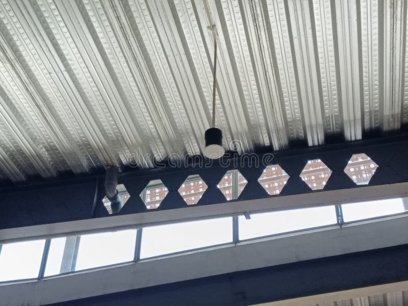 Industrial Ceiling with Brick Patterns and Modern Lighting Stock Photo ...
