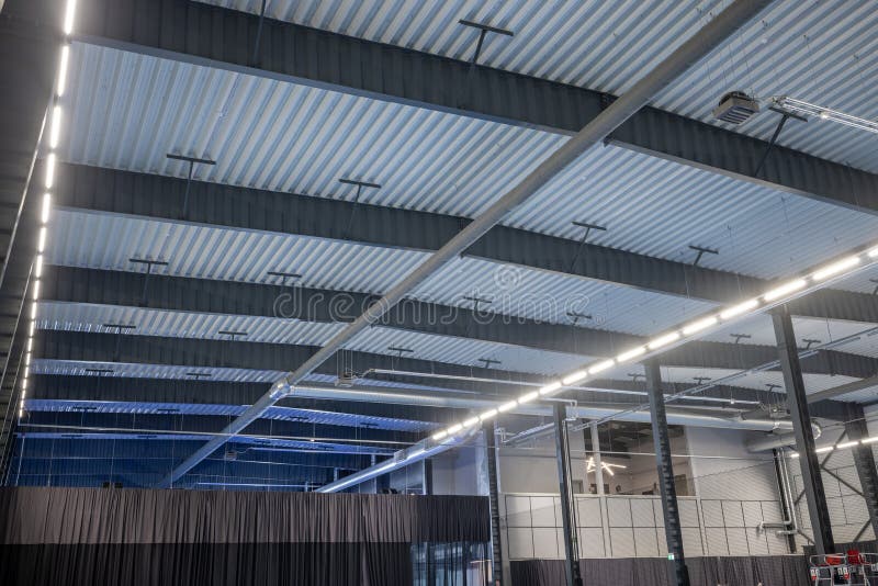 Industrial Ceiling with Metal Beams, Ventilation Ducts, and Fluorescent ...