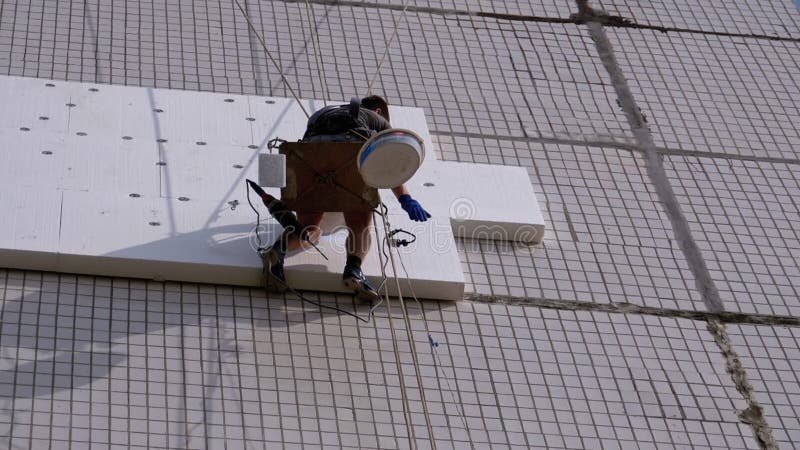 Industrial Climber Insulation of Facade Old High-Rise Building Using ...