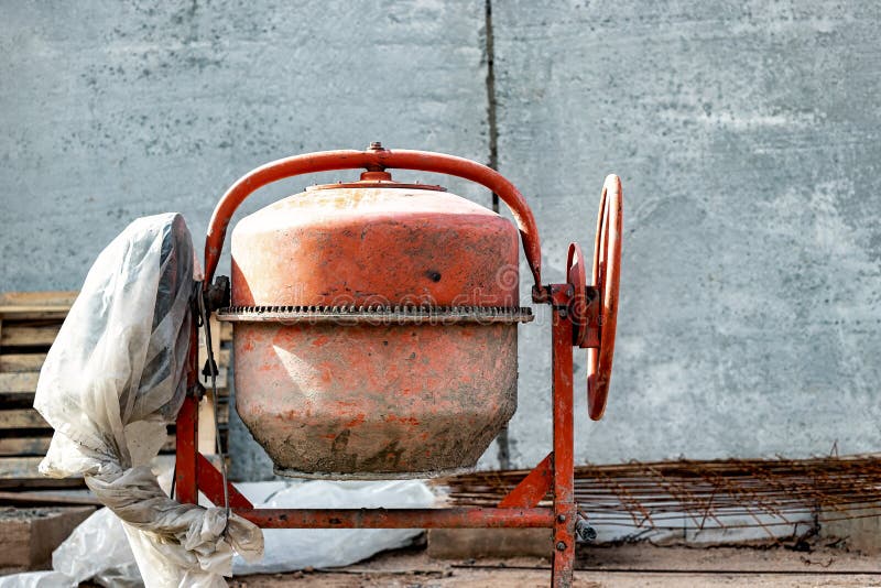 Industrial Concrete Mixer at a Construction Site. Mixing Concrete and ...