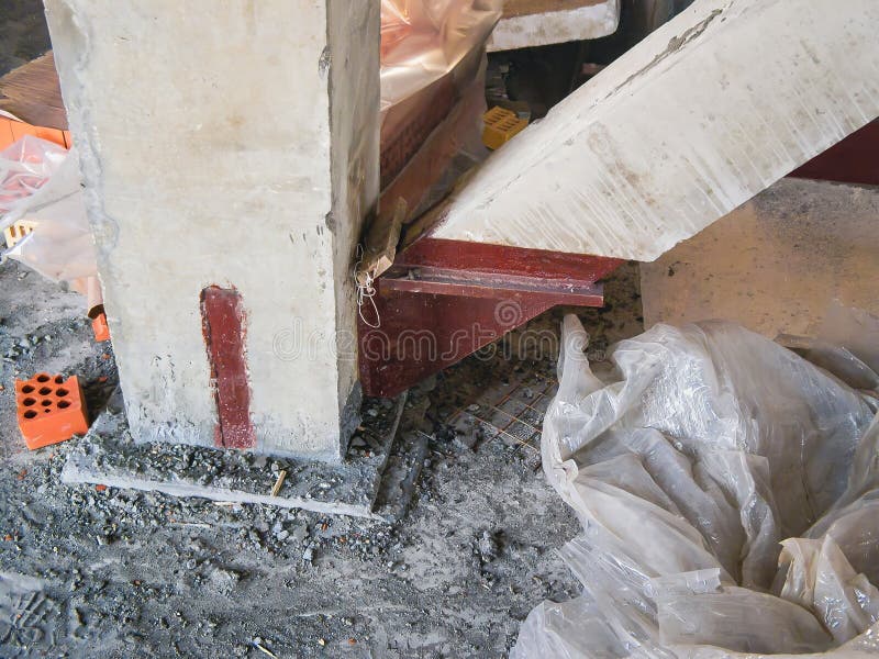 Industrial Construction Scene Featuring a Concrete Pillar and Steel ...