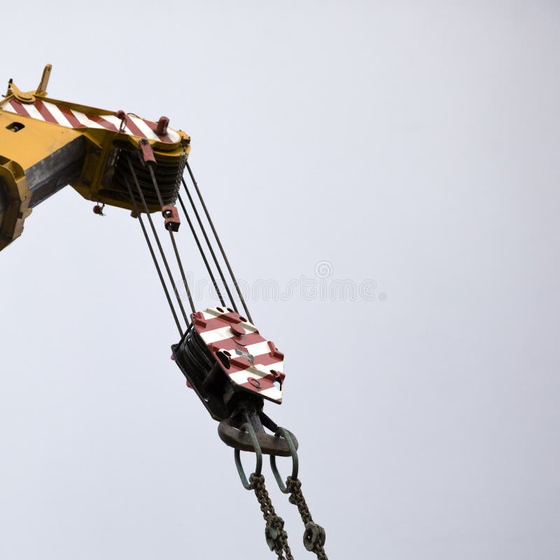 Crane lifting heavy object stock photo. Image of mechanized - 16007210
