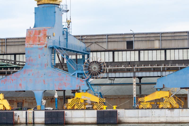 Industrial Crane and Dock Scene, Showcasing Machinery and Structures ...