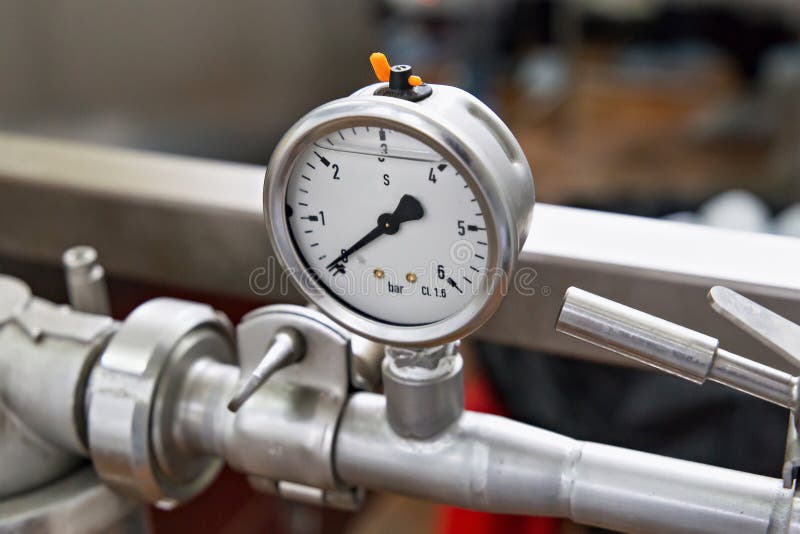 Industrial Dairy Production. View on the Metr on the Milk Factor Stock ...