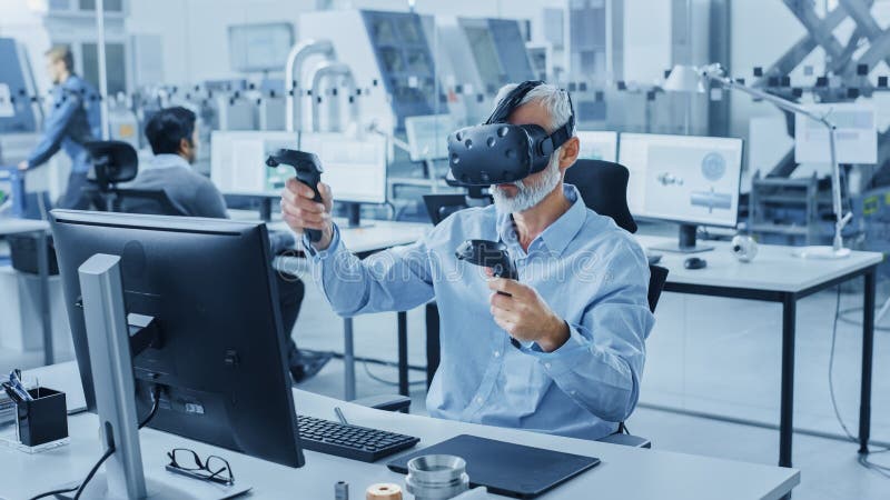Industrial Design Engineer Wearing Virtual Reality Headset and Holding ...
