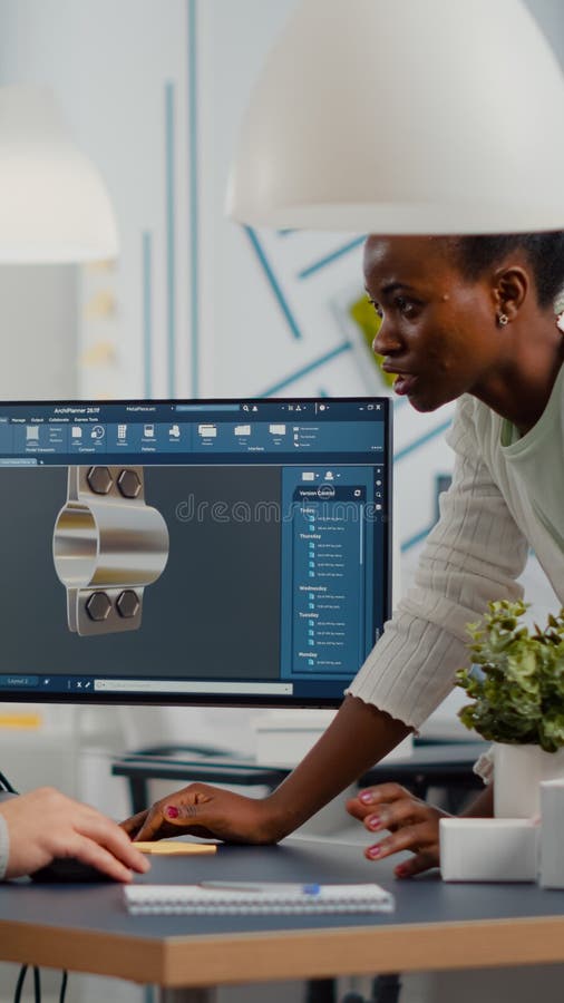 Industrial Engineer and African Project Manager Working Together Stock ...