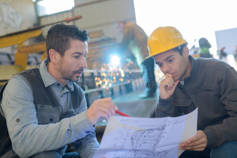 Industrial Engineer Showing Plan To Manager Stock Image - Image of ...