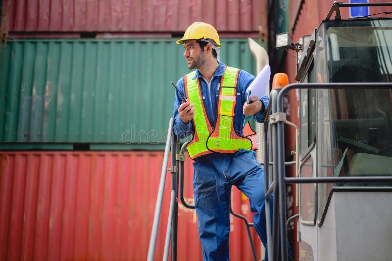 Industrial Engineer Worker Working at Overseas Shipping Container Yard ...