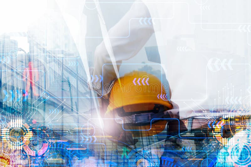 Industrial Engineers with Helmets Blueprints are Reviewing and ...