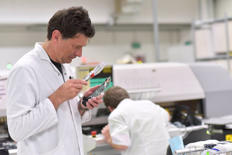 Industrial Factory for Assembly of Microelectronics - Engineer C Stock ...