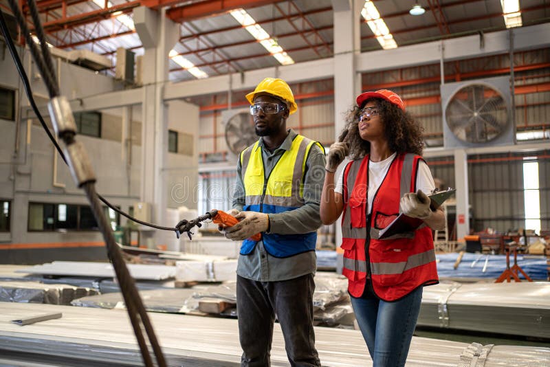 Industrial Factory and Manufacturing Concept. Engineering Working with ...