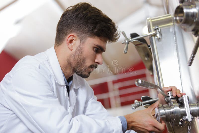 Industrial Factory Worker Turning Valve Stock Image - Image of water ...