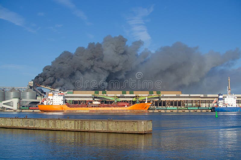 Industrial fire at port editorial photo. Image of dangerous - 144930376