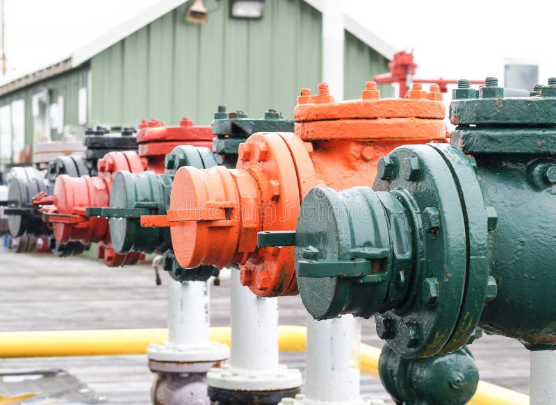 Flow Valves in Different Colors in Line Stock Photo - Image of fuel ...