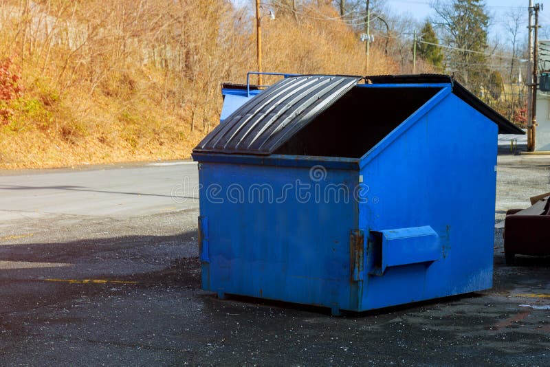 Blue Construction Debris Container Filled with Garbage Bin Stock Photo ...