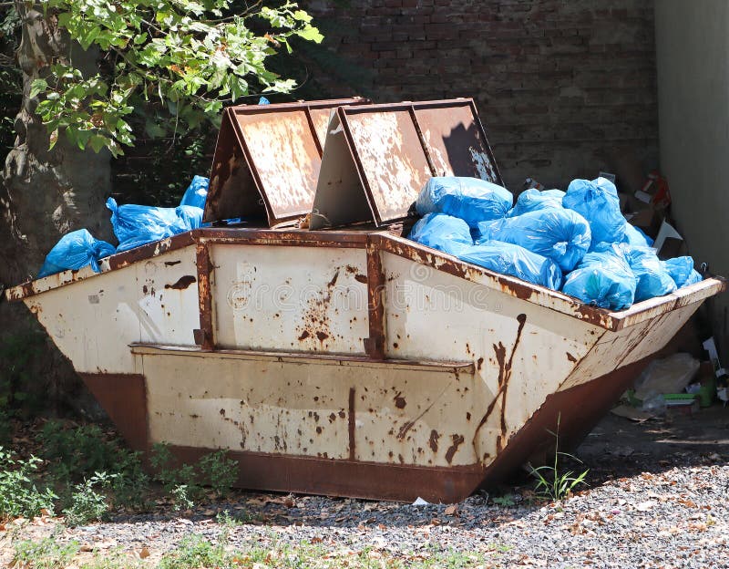 Industrial Garbage Can with Plastic Bags in it Stock Photo - Image of ...