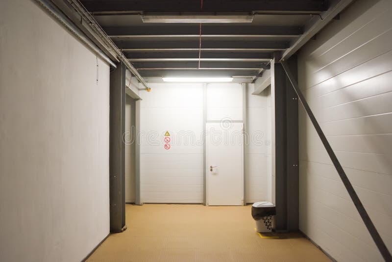 Industrial Interior. Empty Factory Corridor with Closed Door Stock ...