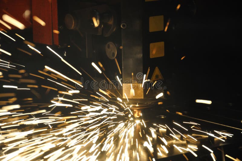 Industrial laser cutter stock image. Image of ablaze - 45847017