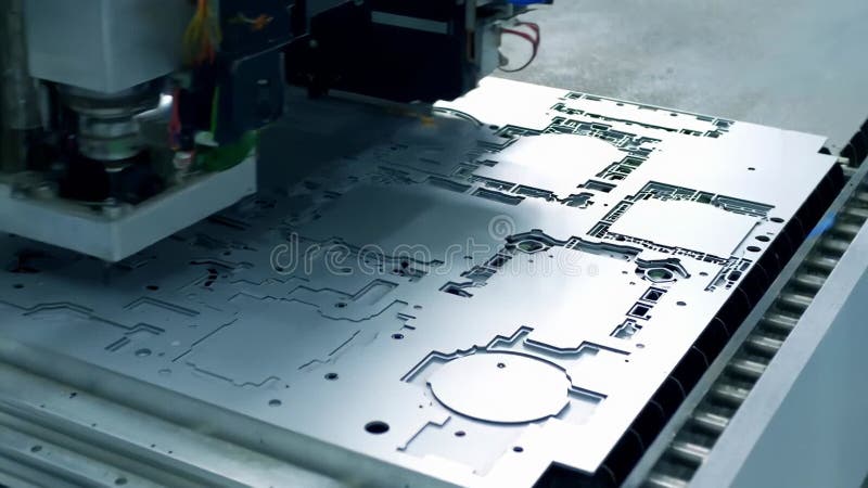 Industrial Laser Cutting through Metal Sheets in a Precision ...