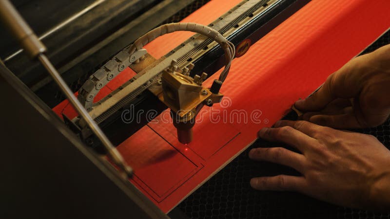 Industrial Laser Engraving on a Paperboard Stock Photo - Image of ...