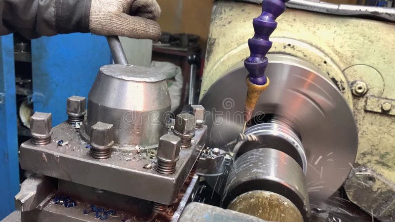 An Industrial Lathe Processes Metal Workpieces with High Precision ...