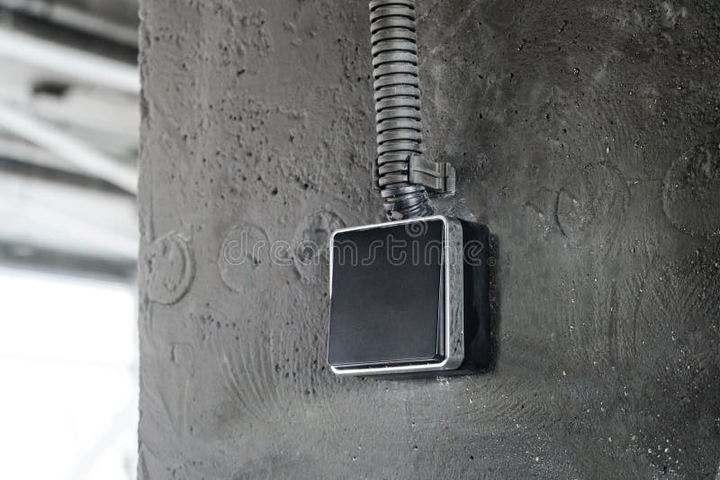 Industrial Light Switch Close-up. Black Button on Grey Surface Stock ...