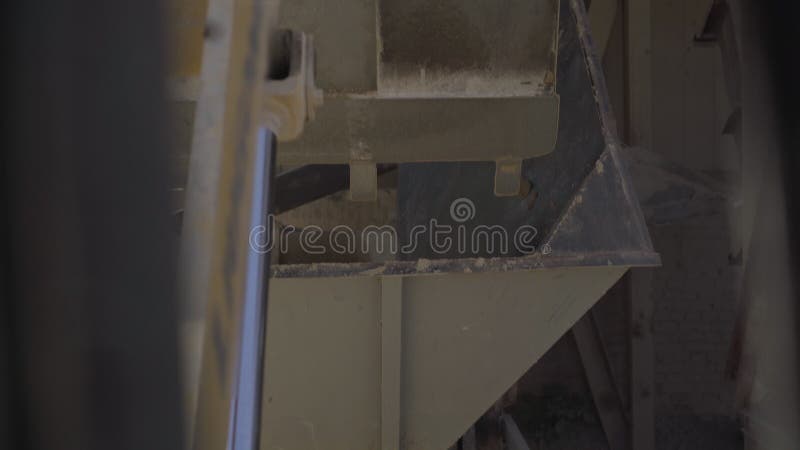 Industrial Loader Tractor Pouring Yellow Sand Out of Bulk and Riding ...