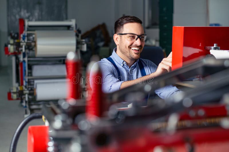 Industrial Machine Operator Working in Factory. Stock Photo - Image of ...