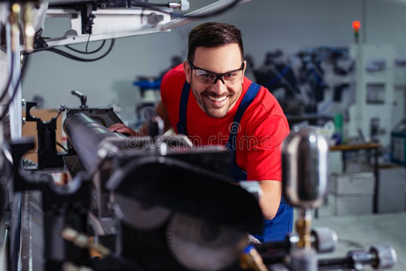 Industrial Machine Operator Working in Factory. Stock Image - Image of ...