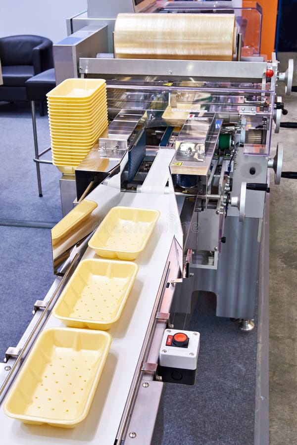Industrial Machine for Packing in Food Production Stock Image - Image ...