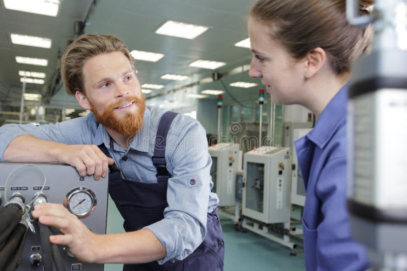 Industrial Man and Woman Engineer in Factory Stock Image - Image of ...