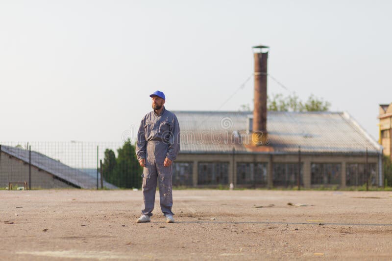 Industrial Manufacturing Factory Worker Posing in Front of the Factory ...
