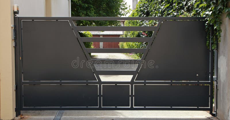Industrial Metal Gate for a Building Stock Image - Image of wrought ...