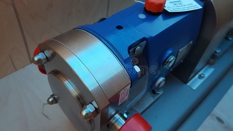 An Industrial Motor Assembly with Blue and Metallic Components ...