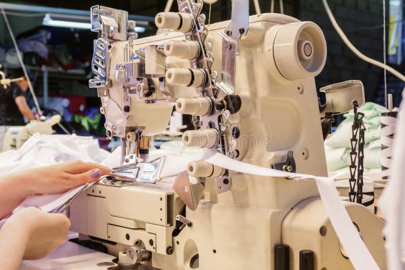 Industrial Overlock Sewing Machine in Work Stock Photo - Image of ...