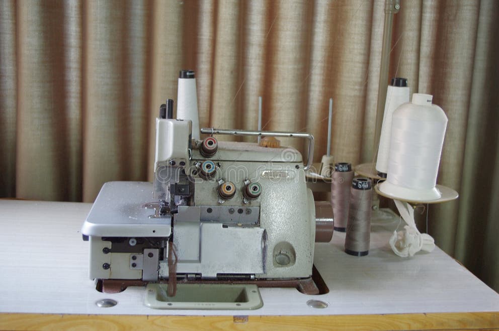 Industrial Overlock Sewing Machine in Sewing Workshop Stock Photo ...