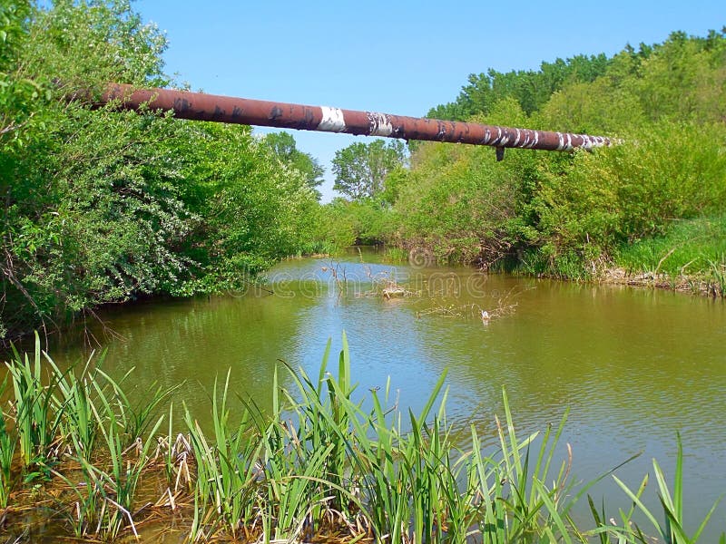Industrial pipe in nature stock image. Image of nature - 78023001