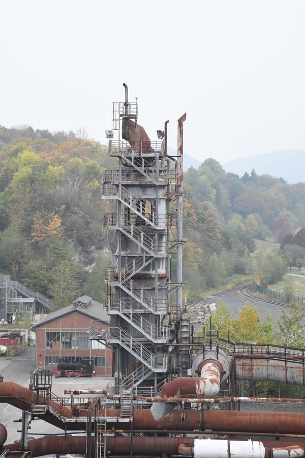 Industrial Pipe Yard Featuring an Array of Pipes Descending Down a ...