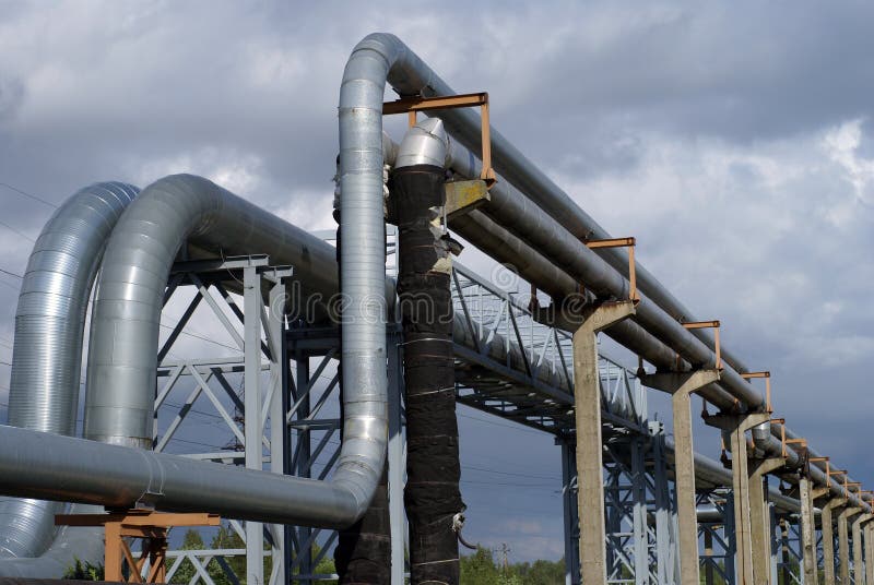 Industrial Pipelines On Pipe-bridge Against Sky Royalty Free Stock ...