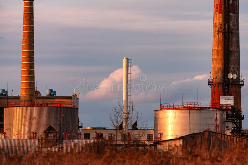 Industrial Plant with Tall Chimneys at Sunset Stock Image - Image of ...