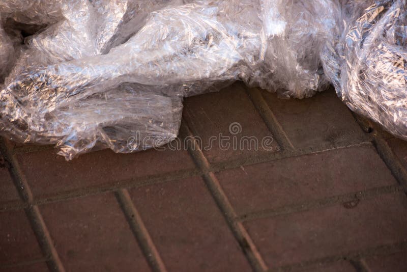 Industrial Plastic Packaging on Pavement Stock Image - Image of package ...