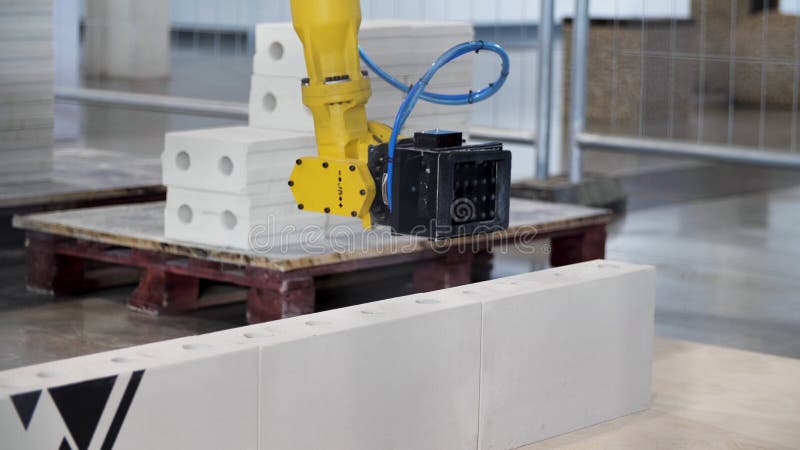 Industrial Robot Exhibit at Work. Media. Bricklayer Robot for Automated ...