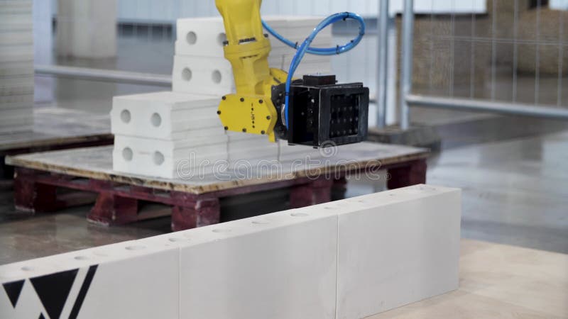 Industrial Robot Exhibit at Work. Media. Bricklayer Robot for Automated ...