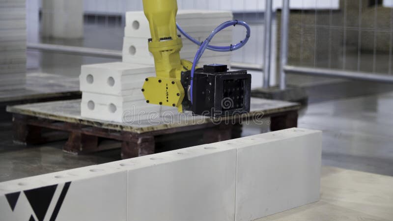 Industrial Robot Exhibit at Work. Media. Bricklayer Robot for Automated ...