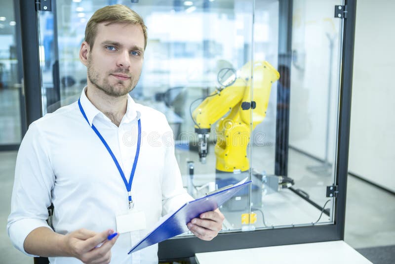 Industrial Robot Maintenance Stock Image - Image of automotive, person ...