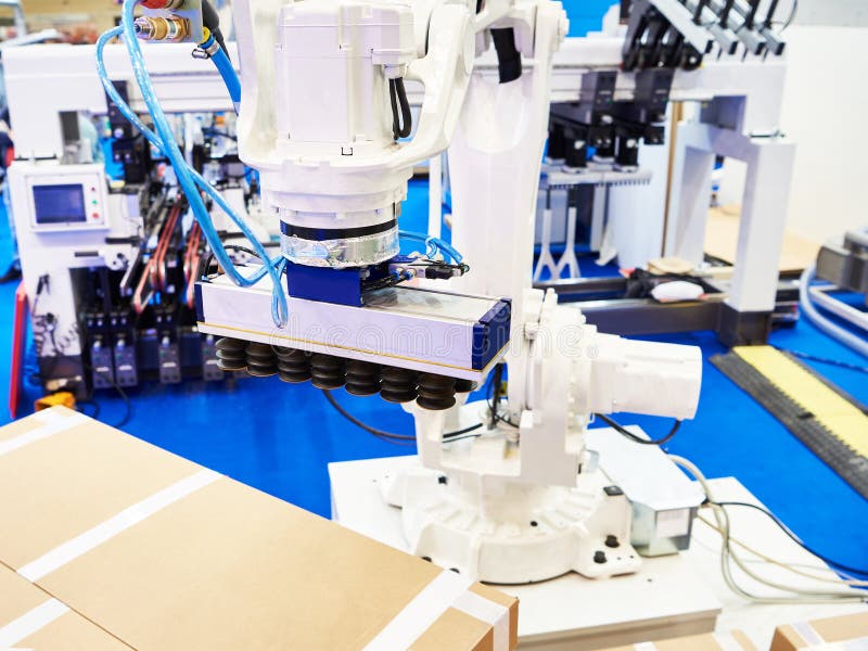 Industrial Robot Manipulator for Moving Boxes Stock Photo - Image of ...