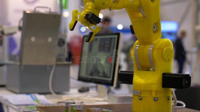 Industrial Robot Manipulator Yellow Color Performs Movements that are ...
